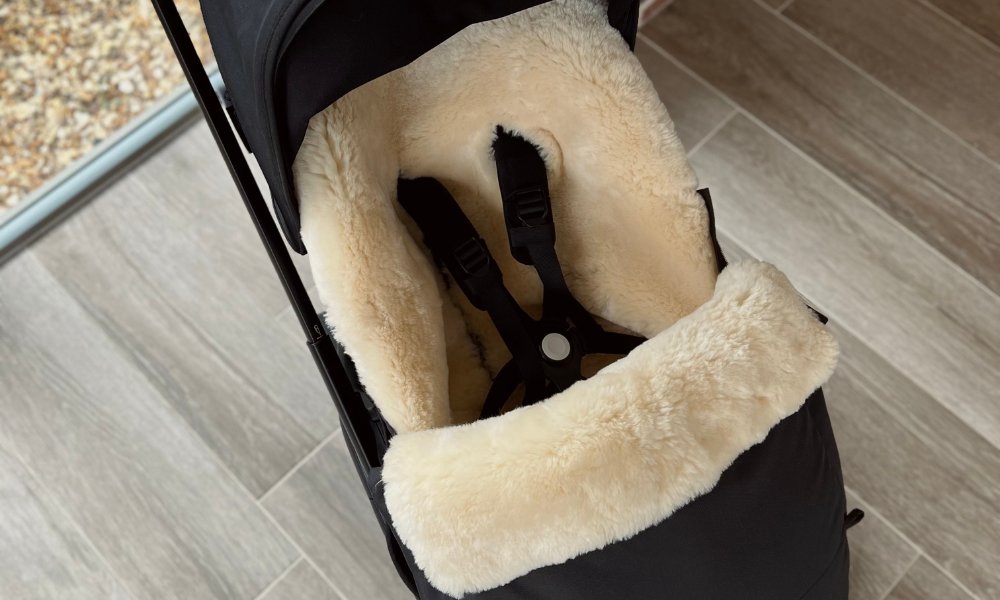 Fitting a Sheepskin Footmuff to Pram with a Solid Back – Baa Baby